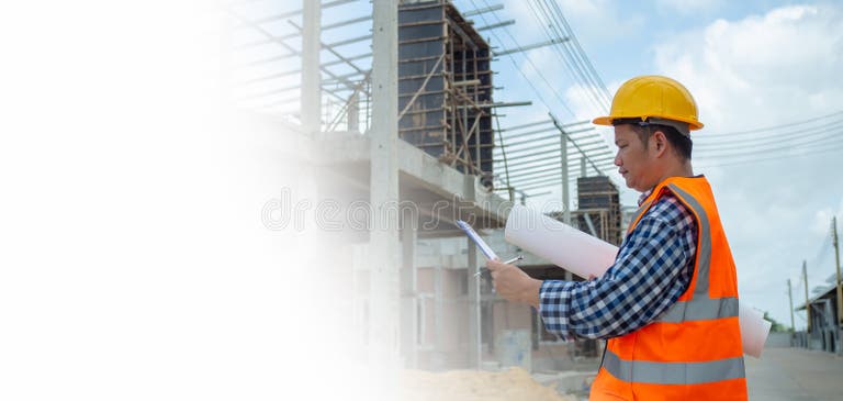 Engineers Holding Blueprint Project Working Outdoors Building Side with ...