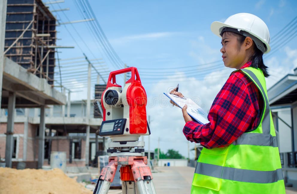 Engineers Holding Documents for Planning and Design for Project at ...