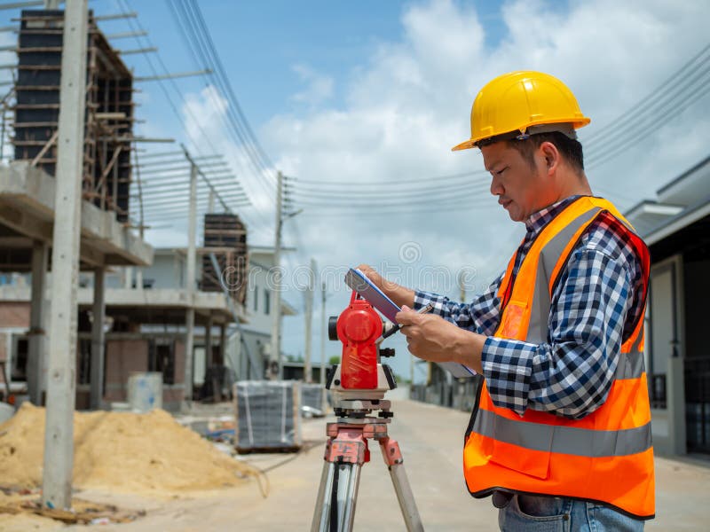 Engineers Holding Documents for Planning and Design for Project at ...