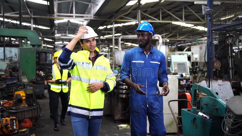 Industrial Workers Observing Automatic Reel Winding Process in Woodwork ...