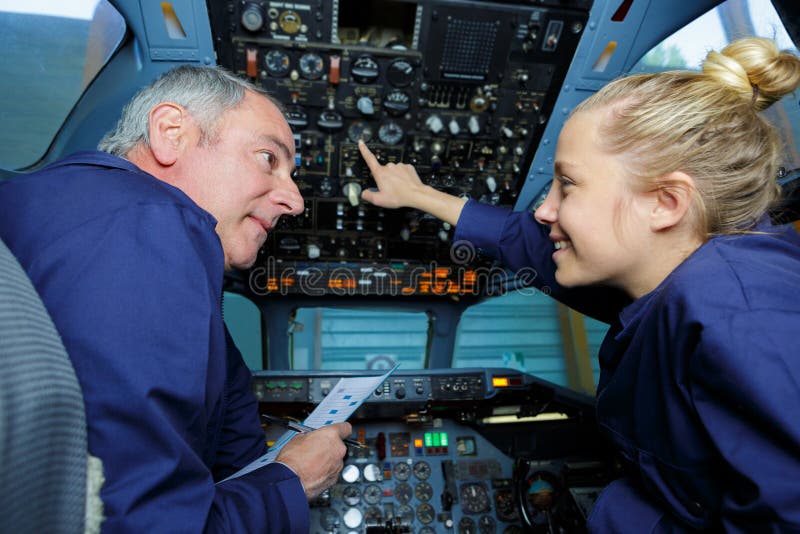 Engineers Inside Planes Cockpit Stock Photo - Image of machine, screen ...