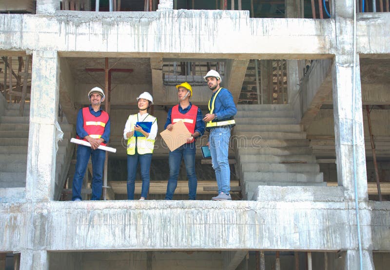 Engineers Inspector and Project Engineers Inspecting the New Building ...