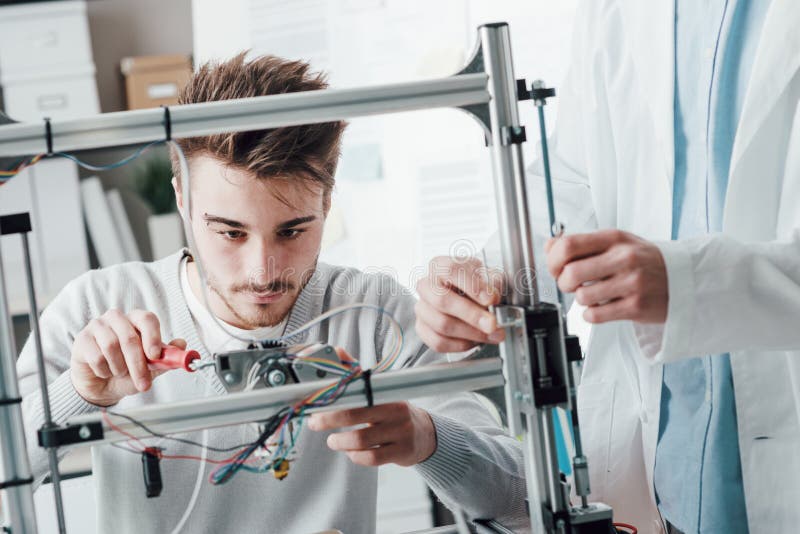 Engineers in the Lab Using a 3D Printer Stock Image - Image of engineer ...