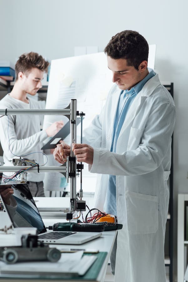 Engineers in the Lab Using a 3D Printer Stock Image - Image of ...