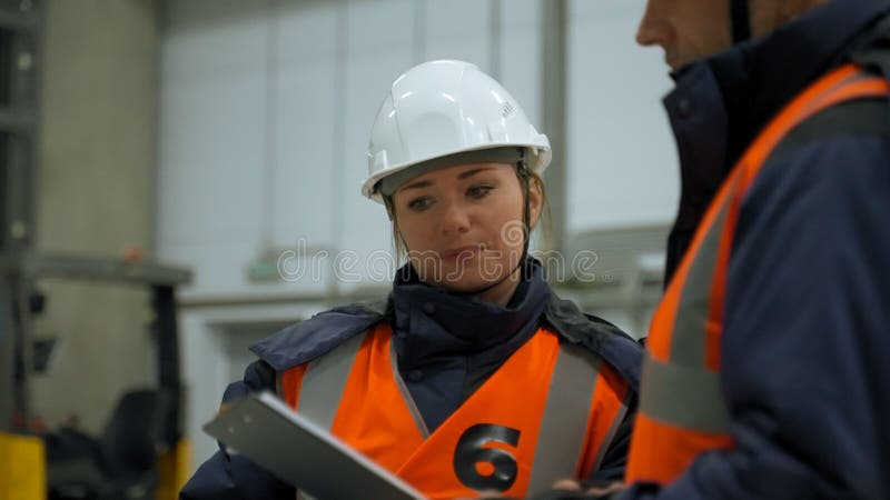 Engineers Look at Clipboard Discussing Plan of Work Stock Video - Video ...