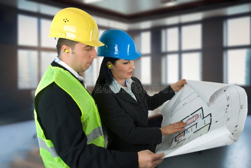 Engineers Look at the Construction Plan Stock Photo - Image of planning ...