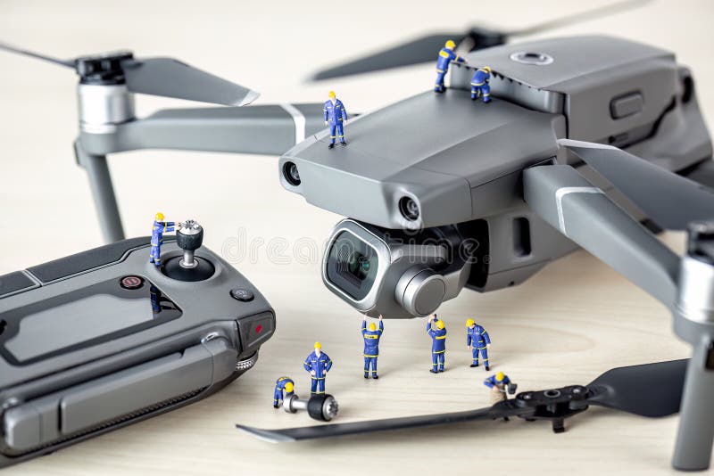 Engineers Maintaining and Repairing a Drone with Camera Stock Image ...