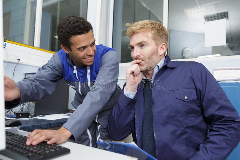 Engineers in Office Looking at Computer Stock Photo - Image of monitor ...