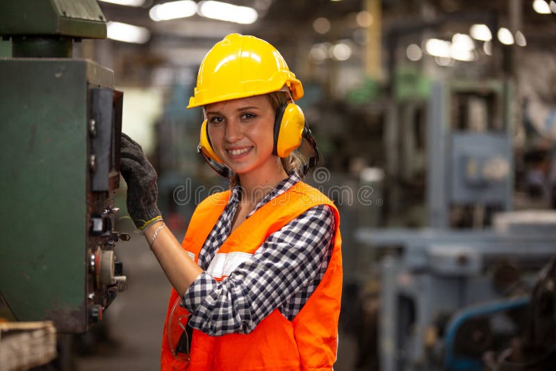 Portrait of Female Engineer Standing with Confident Against Machine ...