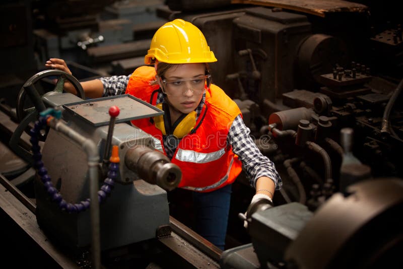 Portrait of Female Engineer Standing with Confident Against Machine ...