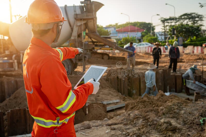 Construction site and team stock image. Image of crane - 159439899