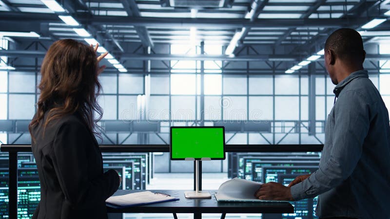 Woman Overseeing Server Room Reading Documentation Paperwork Stock ...
