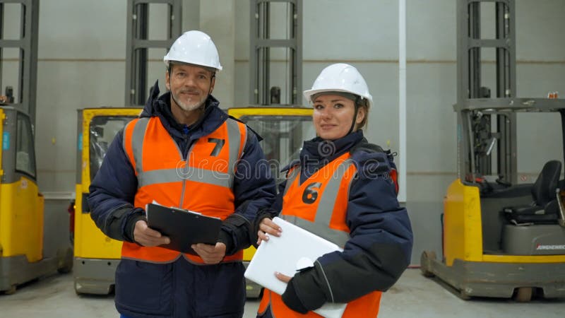 Engineers in Professional Uniform Stand in Storage Terminal Stock Video ...