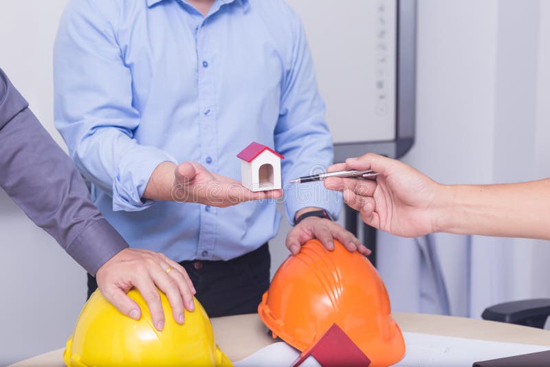 Engineers with the Project Supervisor in the Office Stock Photo - Image ...