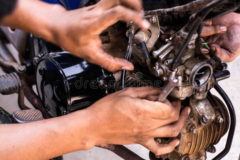 Engineers are Repairing Engines with Tools. Stock Photo - Image of ...