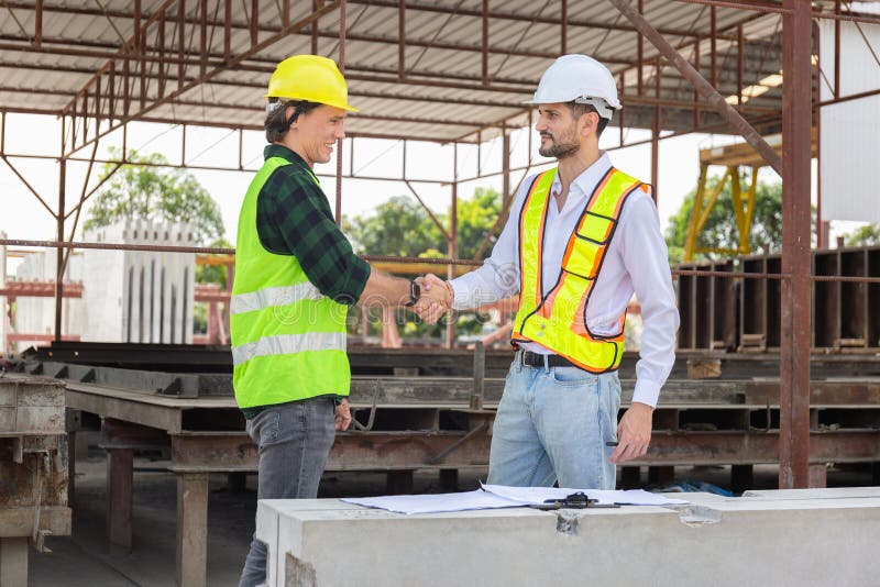 Engineers Shaking Hands at Construction Site, Construction Workers ...