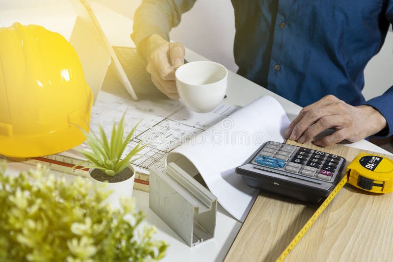 Engineers Sit and Work on Building Design and System Work.,construction ...