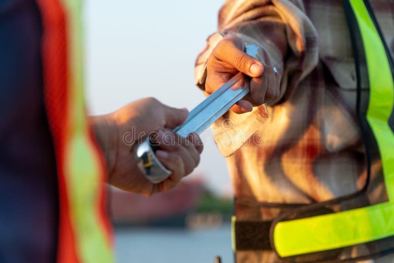 Engineers are Submitting Equipment To Workers. Concepts of Teamwork and ...