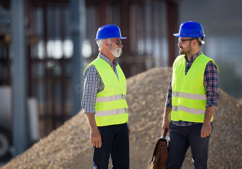 Engineers Talking at Building Site Stock Photo - Image of architect ...