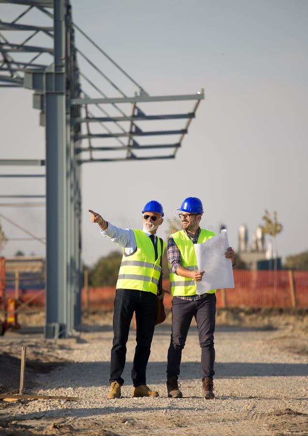 Engineers Talking at Building Site Stock Image - Image of project ...
