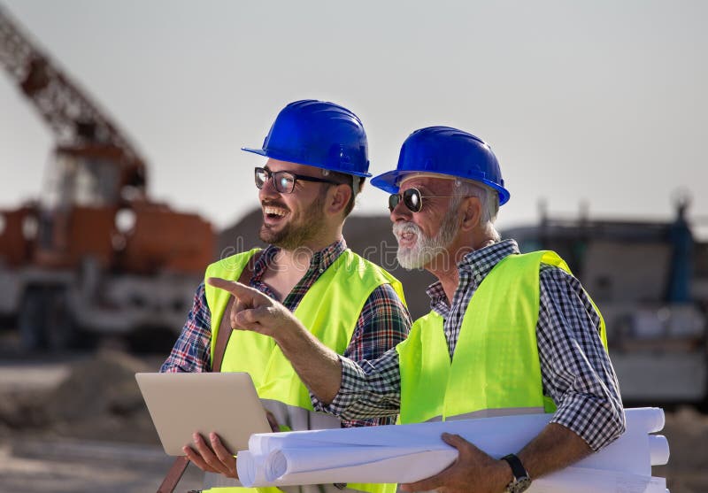 Engineers Talking at Building Site Stock Image - Image of outdoor ...