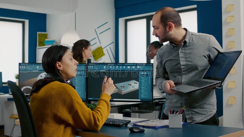 Engineers Talking in Front on Pc and Laptop with CAD Software Stock ...