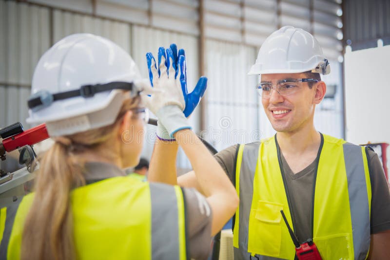 Engineers Team Mechanic Shaking Hand in Steel Factory Workshop ...