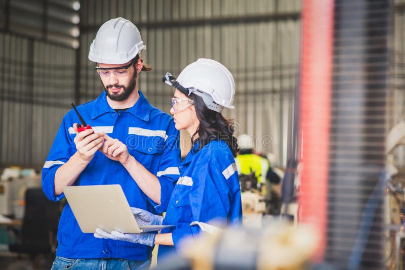 Engineers Team Mechanic Using Computer Controller Robotic Arm for ...