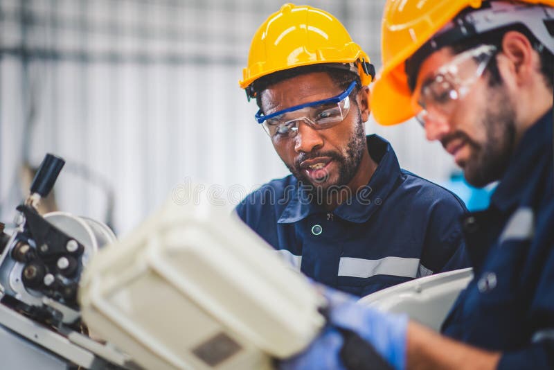 Engineers Team Mechanic Using Computer Controller Robotic Arm for ...