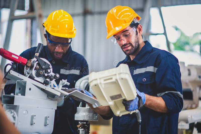 Engineers Team Mechanic Using Computer Controller Robotic Arm for ...