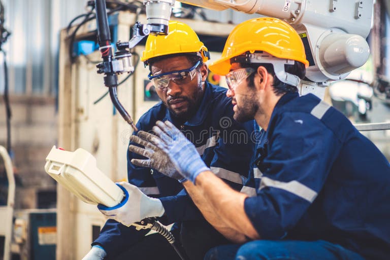 Engineers Team Mechanic Using Computer Controller Robotic Arm for ...