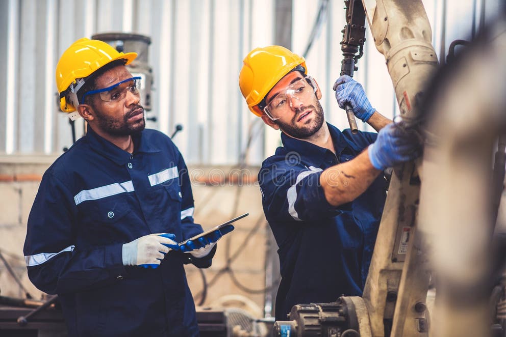 Engineers Team Mechanic Using Computer Controller Robotic Arm for ...