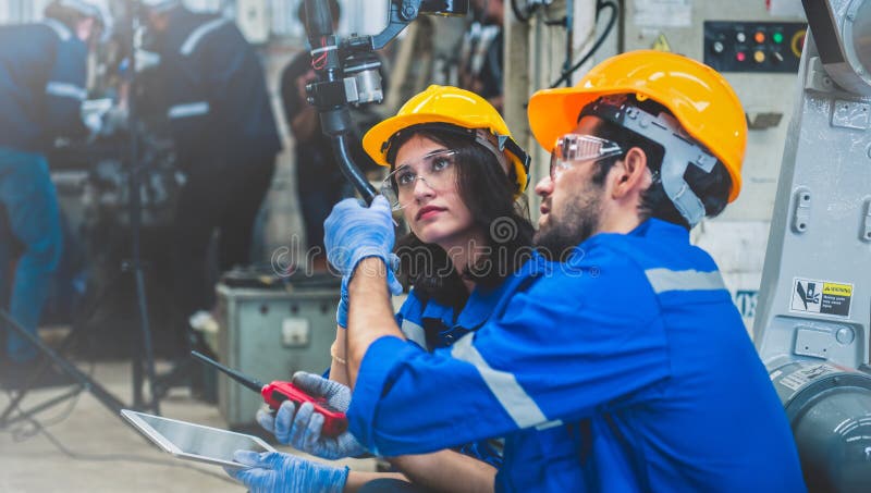 Engineers Team Mechanic Using Computer Controller Robotic Arm for ...