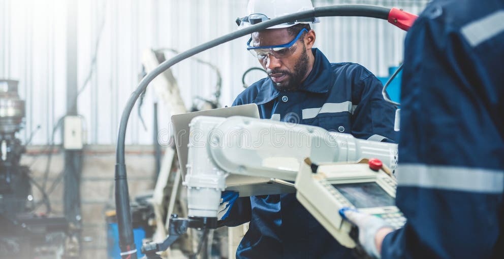 Engineers Team Mechanic Using Computer Controller Robotic Arm for ...