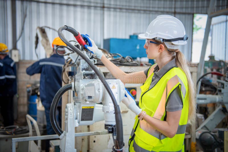 Engineers Team Mechanic Using Computer Controller Robotic Arm for ...