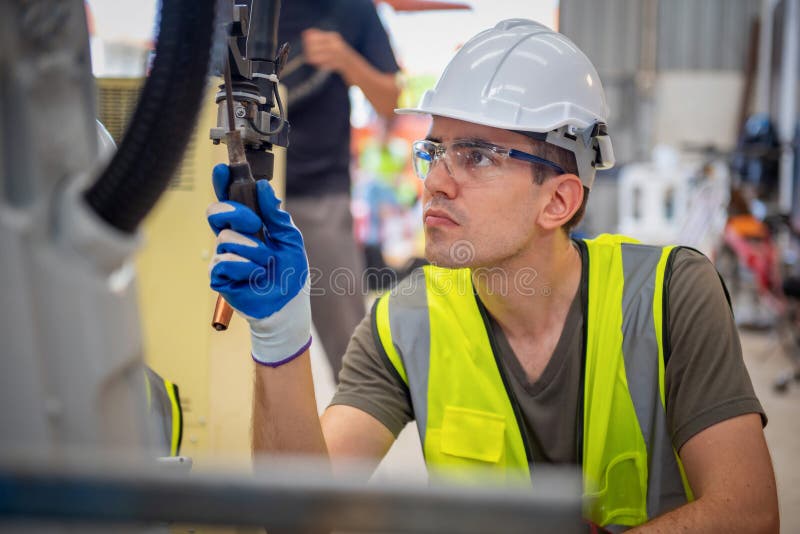 Engineers Team Mechanic Using Computer Controller Robotic Arm for ...