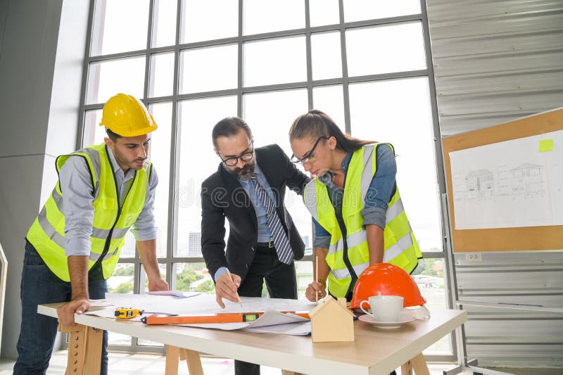 Engineers Team Meeting for Architectural Project. Architects Discussing ...