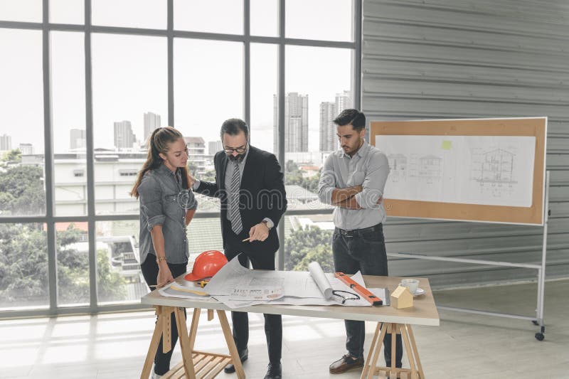 Engineers Team Meeting for Architectural Project. Architects Discussing ...