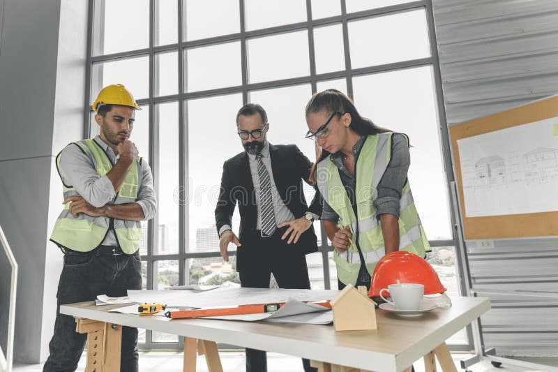 Engineers Team Meeting for Architectural Project. Architects Discussing ...