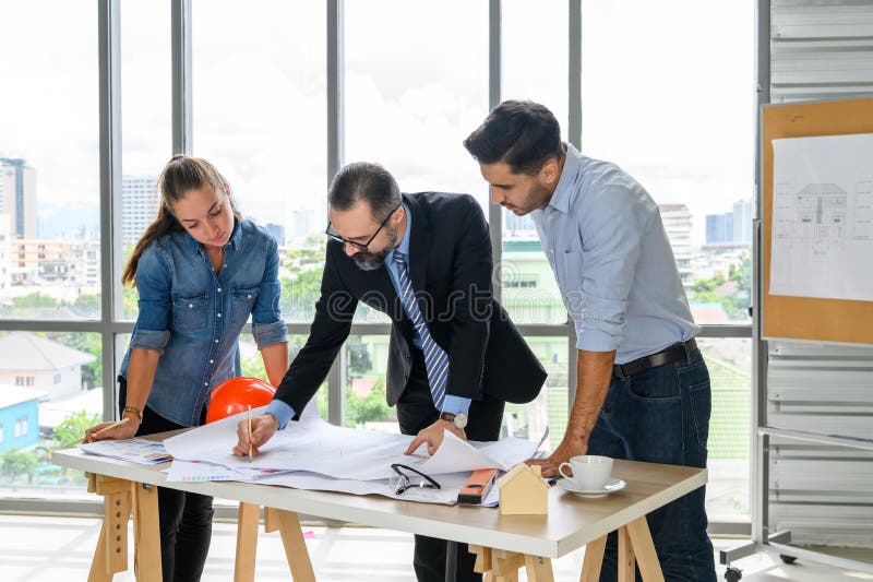 Engineers Team Meeting for Architectural Project. Architects Discussing ...