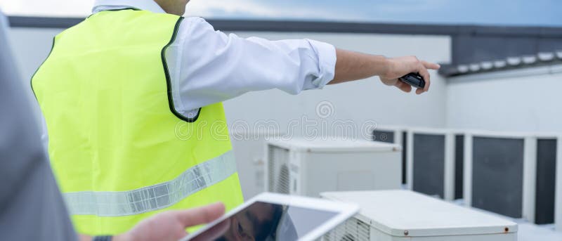 Engineers Team Use Tablet Check Air Condition Systems on Site ...