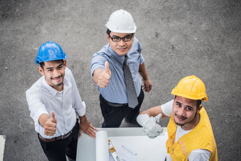 Engineers and teamwork stock image. Image of building - 107097349