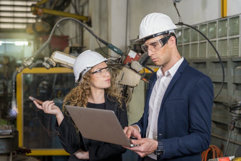 Engineers and Technicians are Using a Remote Control and a Laptop To ...