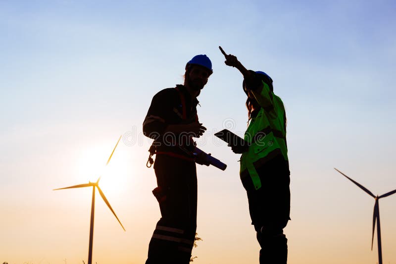 Engineers Technicians Working with Teamwork at Wind Turbine Field Stock ...