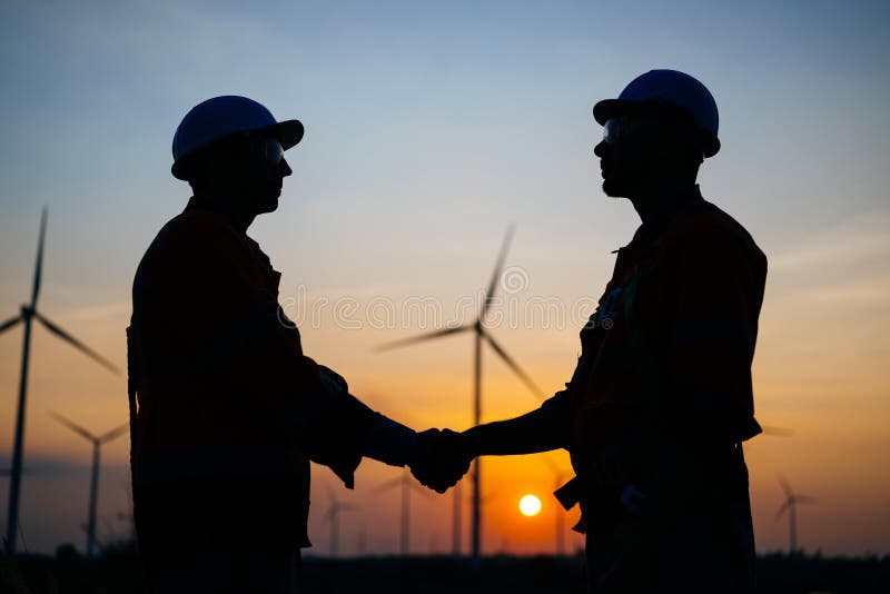 Engineers Technicians Working with Teamwork at Wind Turbine Field Stock ...