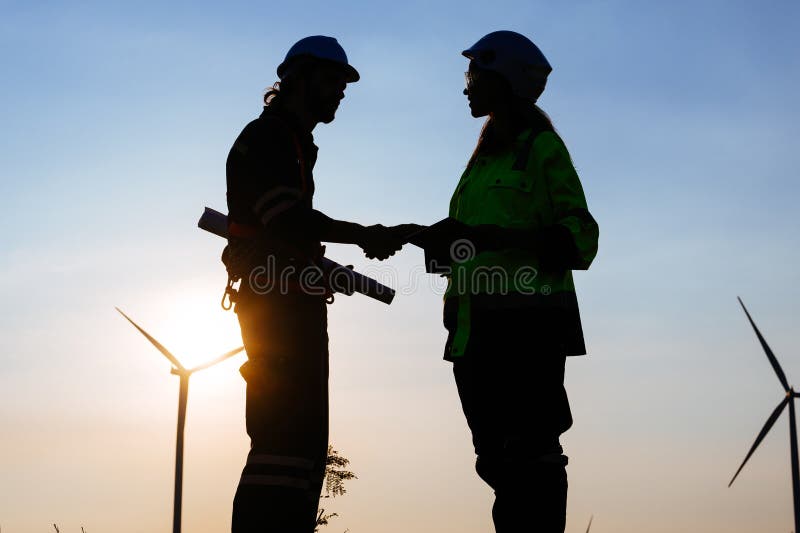 Engineers Technicians Working with Teamwork at Wind Turbine Field Stock ...