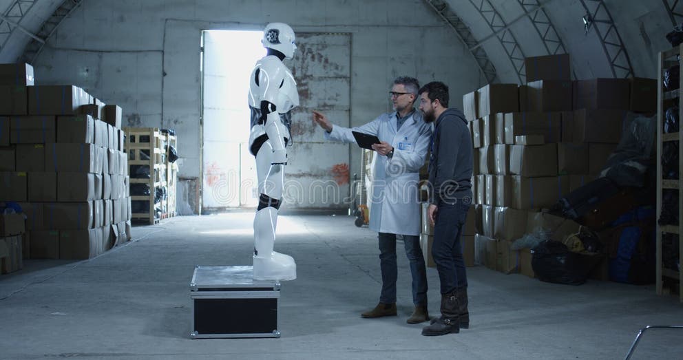 Engineers Testing Robot in a Warehouse Stock Photo - Image of testing ...