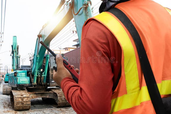 Engineers Use Radio Communication Devices To Control the Operation of ...