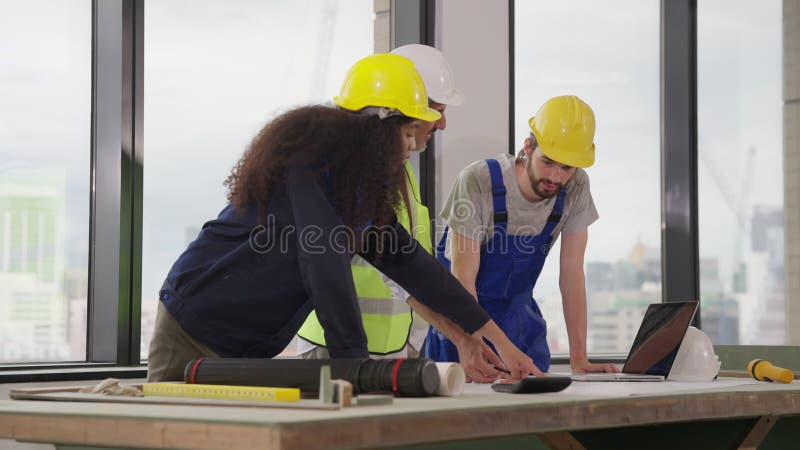 Engineers Using Blueprint of Project Plan Brainstorming and Working ...
