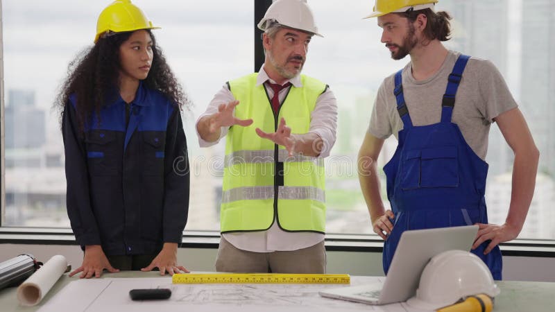 Engineers Using Blueprint of Project Plan Brainstorming and Working ...